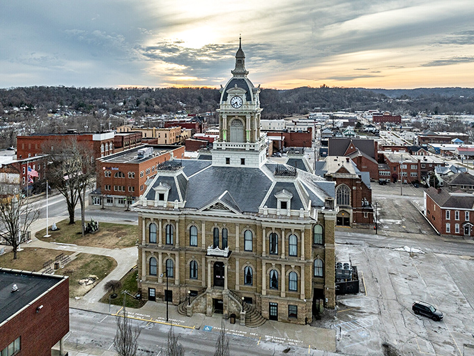 The stunning Cambridge courthouse dominates the skyline, a testament to when small towns built big dreams in limestone and pride.