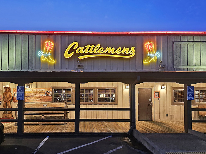 Those glowing neon cowboy boots at Cattlemen's aren't just for show - they're beacons guiding hungry travelers to steak nirvana.