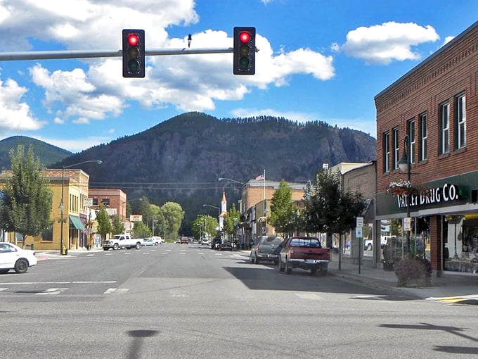 Chewelah's traffic lights say "pause and admire that mountain!" Valley Drug Co. probably dispenses fishing tips too.