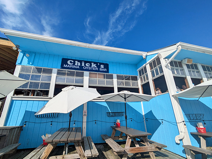 Chick's vibrant blue exterior is as refreshing as the ocean breeze that flows through its waterfront dining area.