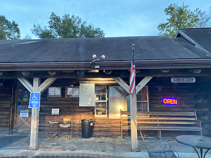 Chopping Block's humble log cabin exterior hides a temple of beef worship. Don't let the rustic vibes fool you.