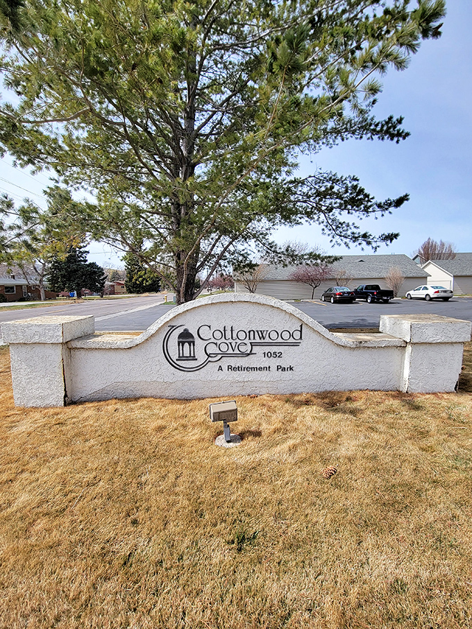 Cottonwood Cove's stone entrance sign promises the kind of community every retiree dreams about.