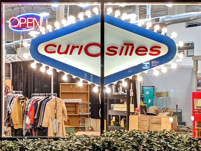 The retro diamond sign glows with mid-century charm &ndash; Curiosities delivers exactly what its name promises!