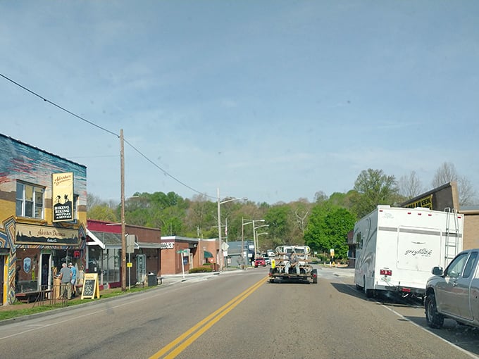 Main Street in Damascus welcomes visitors with colorful storefronts and small-town charm. The mountains in the background promise adventure around every corner.