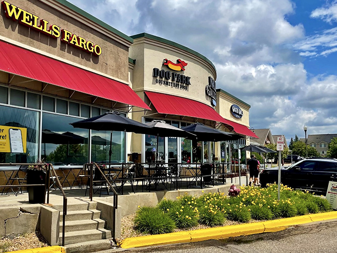 Dog Park's shopping center location might surprise you, but those red awnings signal serious hot dog business is happening here.