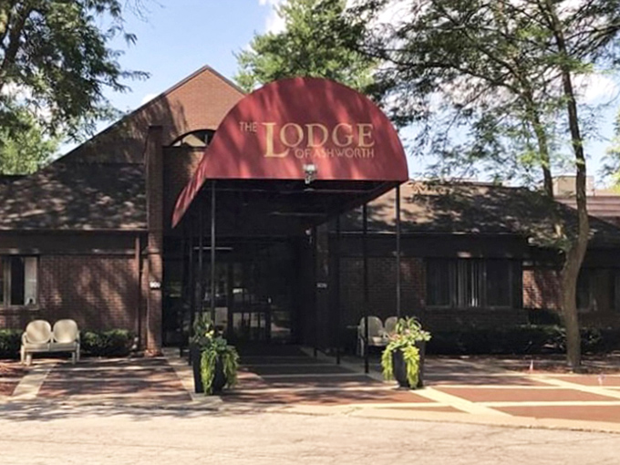 The Lodge of Ashworth announces itself with that distinctive red awning &ndash; like a friendly wink in West Des Moines.