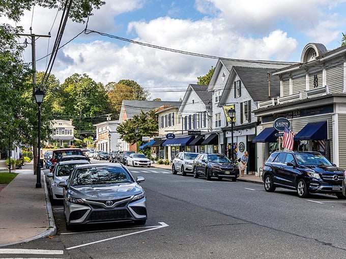 The charming main street of Essex invites visitors to stroll past shops with classic New England architecture and welcoming storefronts.