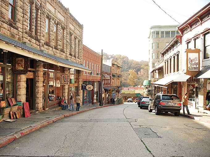 Eureka Springs' Victorian buildings climb hillsides like a fairy tale that forgot to end.