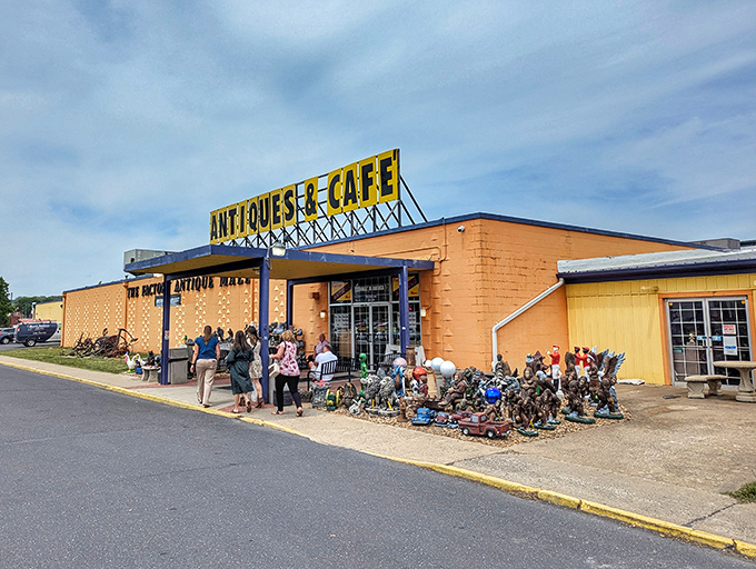 The Factory Antique Mall's bright orange facade stands out like a beacon for bargain hunters on the highway.