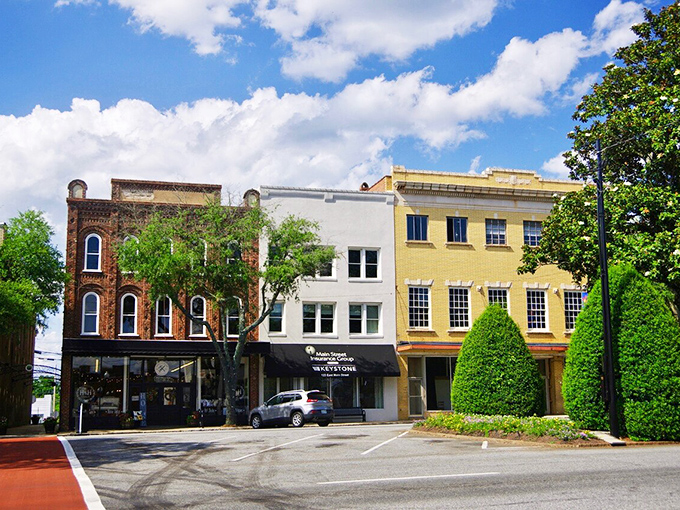 Classic storefronts line up like well-dressed guests at a wedding, each one bringing its own unique personality.
