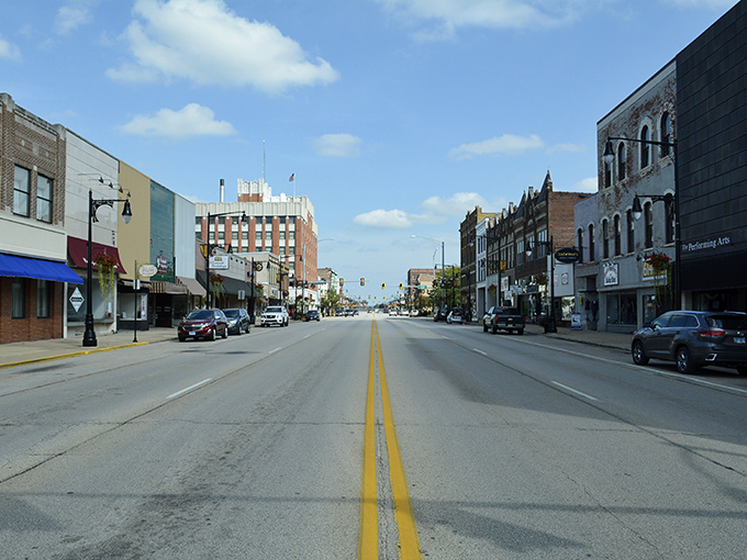 Sunlight bathes Galesburg's brick facades, where small-town commerce continues much as it has for over a century.