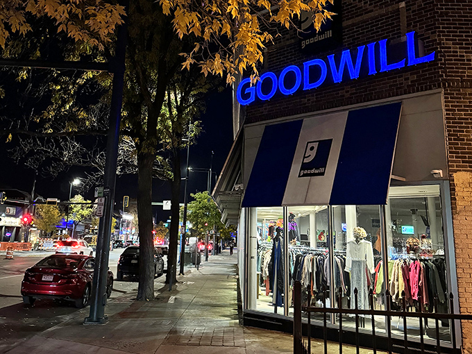 Goodwill after dark&mdash;when the blue sign glows, the treasure hunting begins. Broadway's nighttime bargain beacon never sleeps.