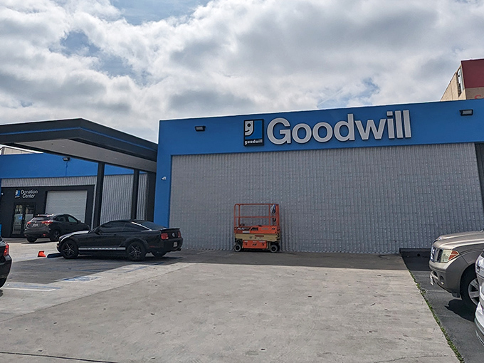 Goodwill's Sunset Boulevard location sports that iconic blue facade. Like a thrift store superhero, it stands ready to rescue both wardrobes and wallets.