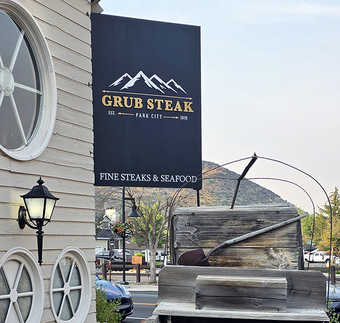 Blue shingles and industrial lighting create an unexpectedly cozy vibe for serious carnivorous adventures ahead.