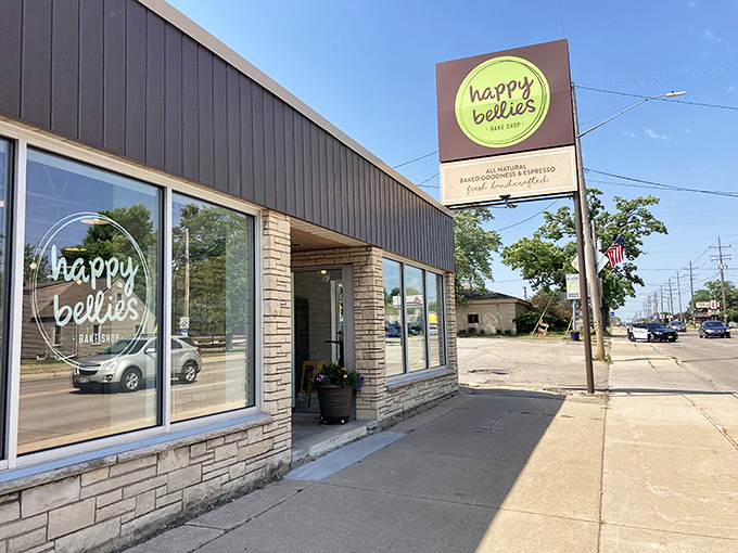 Happy Bellies' modern stone facade and cheerful green sign promise a fresh take on traditional treats. Architectural eye candy for your actual candy.