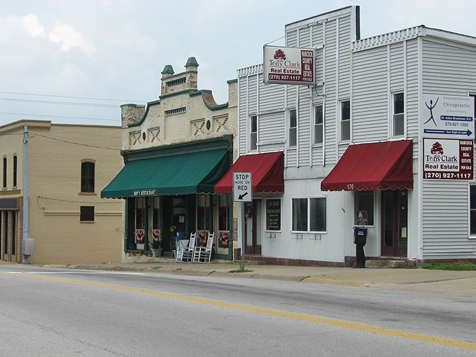 Hawesville's storefronts with their colorful awnings look like they're dressed up for a small-town parade that happens every day of the year.