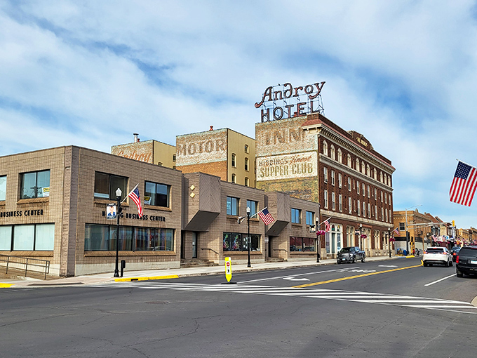 The Androy Hotel stands as Hibbing's brick sentinel, a reminder that Iron Range hospitality comes with prices that won't break the bank.