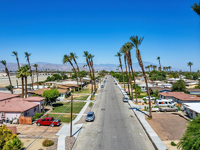 Palm-lined streets stretch toward desert mountains in Indio, where sunshine isn't just weather&mdash;it's a lifestyle choice.