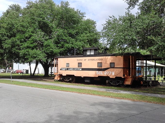 All aboard nostalgia! Interlachen's vintage caboose stands as a rusty reminder of Florida's railroad heyday.