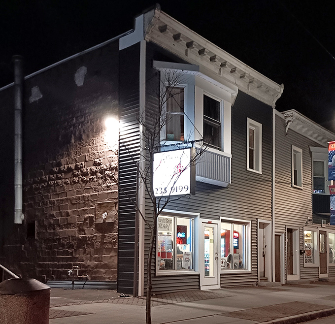 Jimmy's looks like your neighbor's house, but serves pizza that tastes like pure neighborhood love.