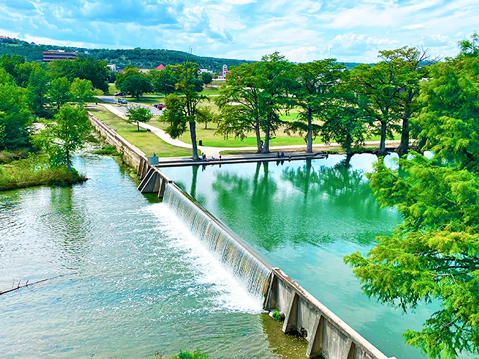 The Guadalupe River flows through Kerrville like nature's own air conditioning system for weary souls.