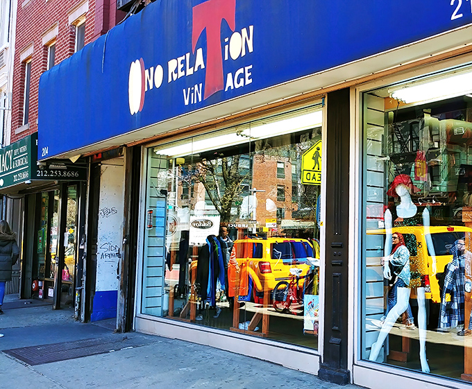 L Train Vintage: That bold blue storefront screams "character." Window-shopping here is like peeking into New York's colorful fashion past.