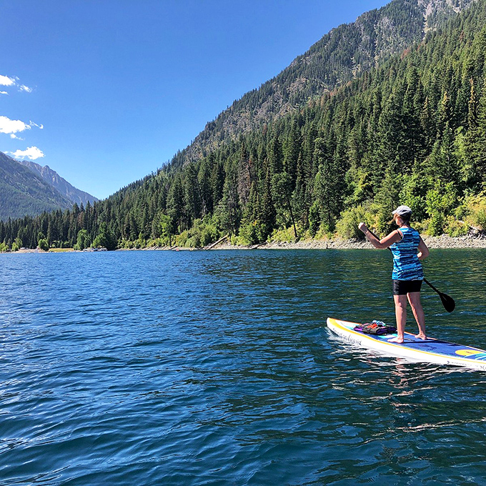 Paddleboarding on Wallowa Lake with mountains standing guard? This is what retirement dreams are made of, folks!