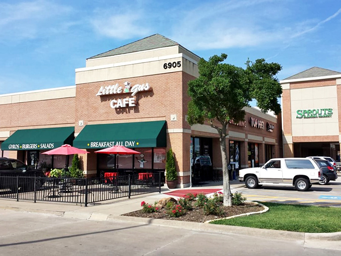 Little Gus Cafe might sit in a shopping center, but those green awnings promise breakfast magic worth any detour.