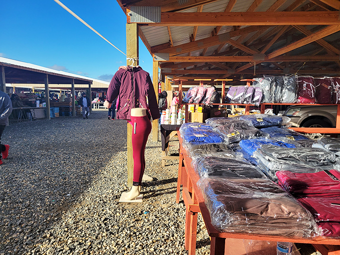 Clothing racks stand at attention like colorful soldiers, ready to outfit families on budgets.