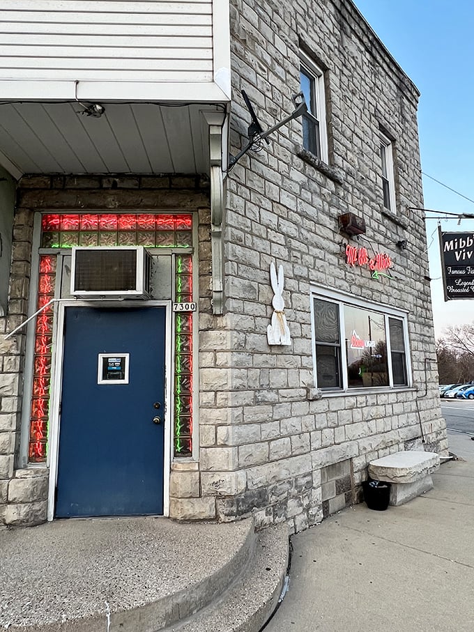 That charming stone building looks like it's been guarding a delicious secret in this quiet Lannon neighborhood for generations.
