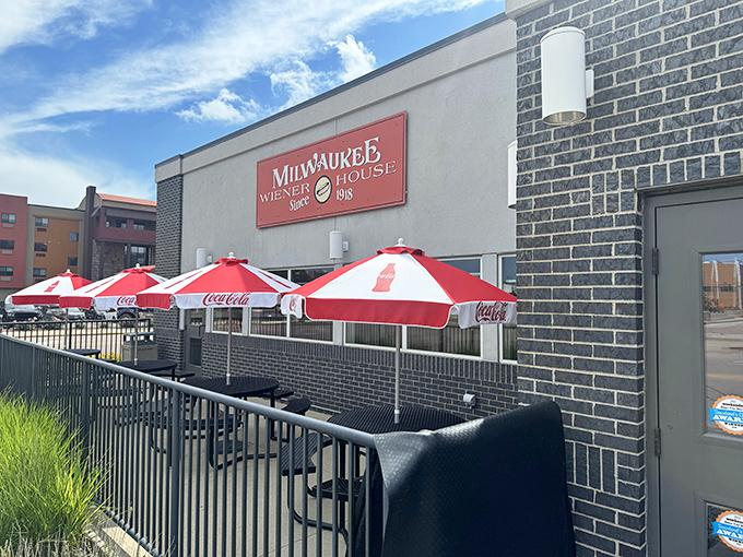 Those red and white umbrellas are like beacons guiding hungry souls to hot dog heaven.
