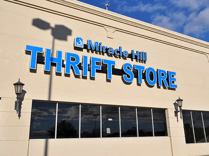 Miracle Hill's bold blue signage promises a wonderland of secondhand treasures inside. Thrifting with a mission!