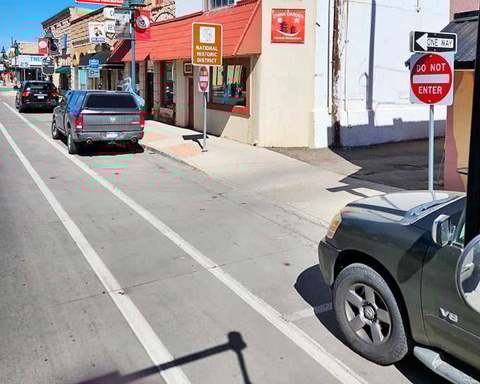 Monte Vista's commercial district showcases classic small-town storefronts. Even the parked cars seem to be taking a leisurely break from the road.