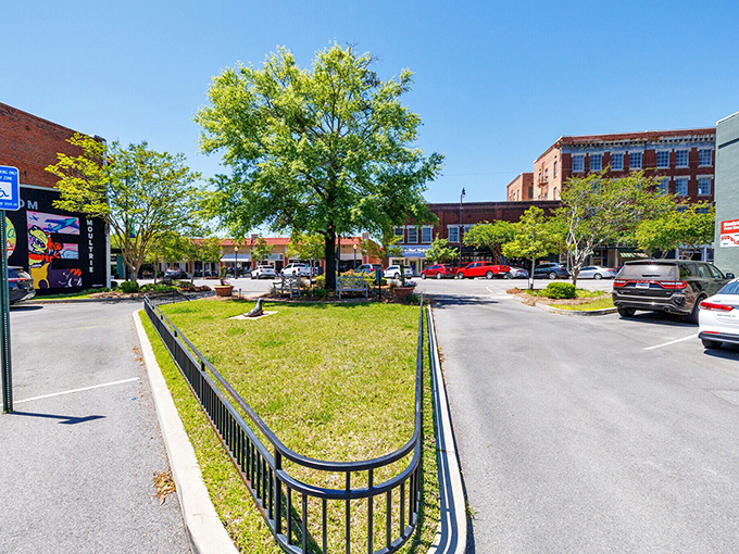 Downtown squares don't get much prettier than this, where shade trees and historic charm create perfect gathering spots.