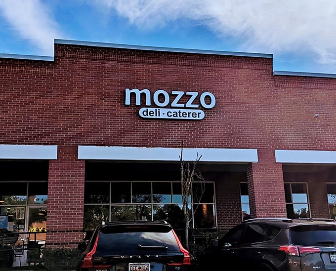 Mozzo Deli's modern brick facade stands like a temple dedicated to the art of sandwich craftsmanship.