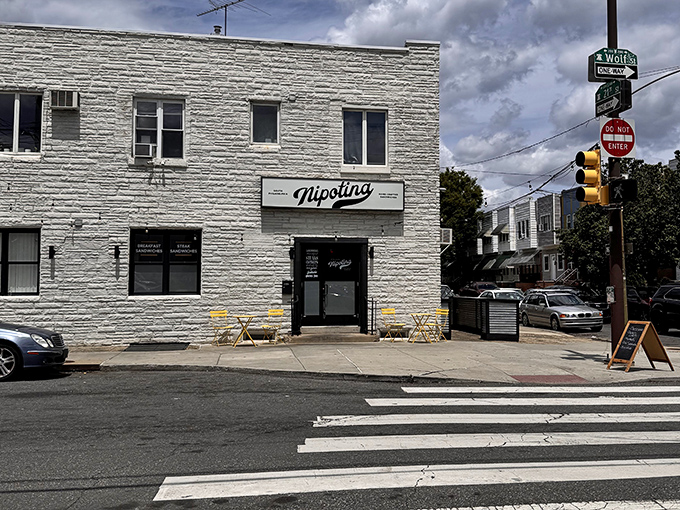 Minimalist white stone exterior, maximum flavor inside. Like finding a perfect album from a band you've never heard of.