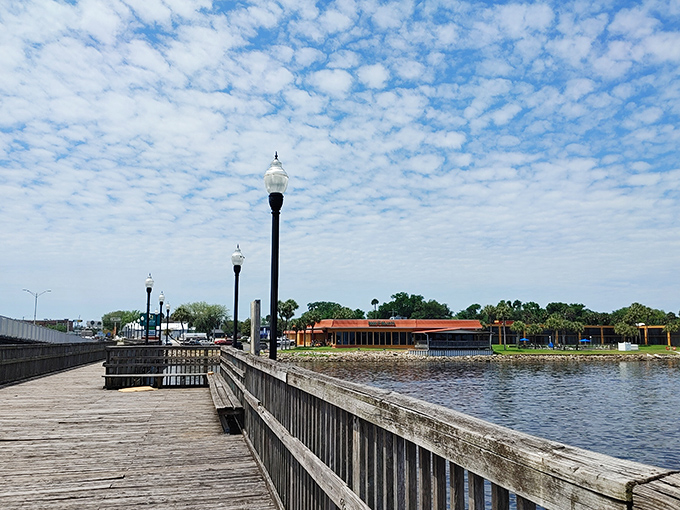 Palatka's riverfront boardwalk stretches like a wooden highway to tranquility, perfect for morning coffee and evening reflections.