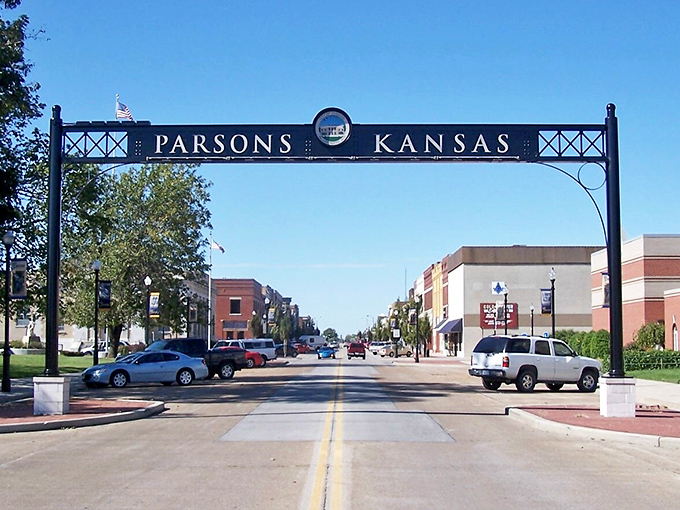 Parsons welcomes visitors with an archway that frames Main Street like a picture-perfect postcard scene.