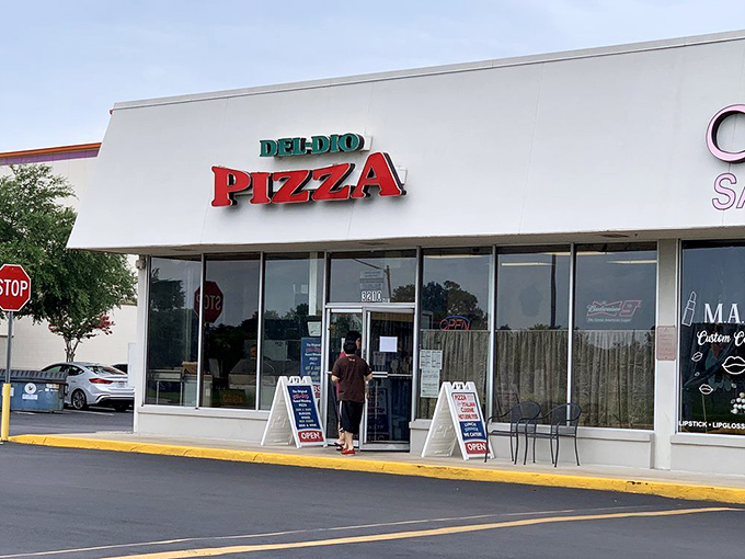 Del-Dio's bright sign promises pizza salvation in an ordinary strip mall &ndash; proof that treasures hide in plain sight.