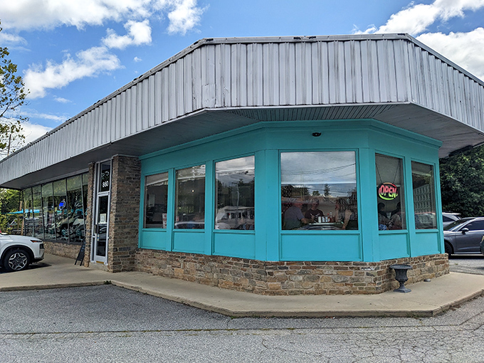 Pop's turquoise corner catches your eye like a delicious mirage. This little diner packs big flavor into every bite!