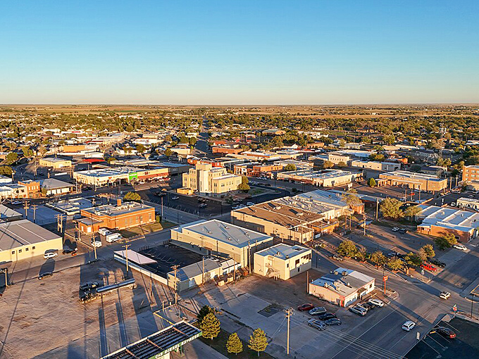 Portales welcomes visitors with the kind of friendly signage that makes you feel like family before you park.