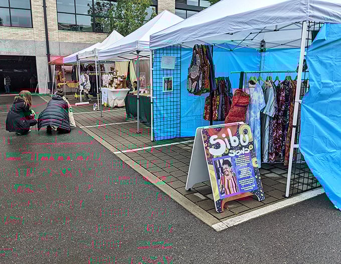 White tents lined up like a treasure hunter's dream - outdoor shopping at its finest.