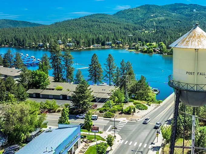 Post Falls from above reveals a perfect small-town tapestry where blue waters, green pines, and charming streets create postcard-worthy views.