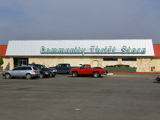 Stone accents and green lettering promise community spirit lives strong in this generous thrift haven.