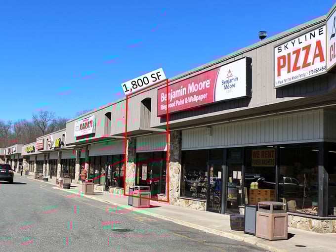 Strip mall practicality meets small-town convenience in Ringwood, where everyday errands become part of your scenic day trip adventure.