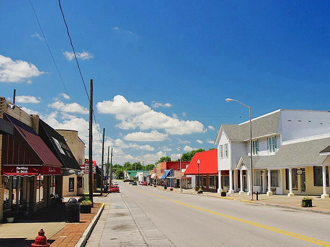 That red-roofed row in Russell Springs is like a welcome committee! Small-town charm with prices that won't make you faint.