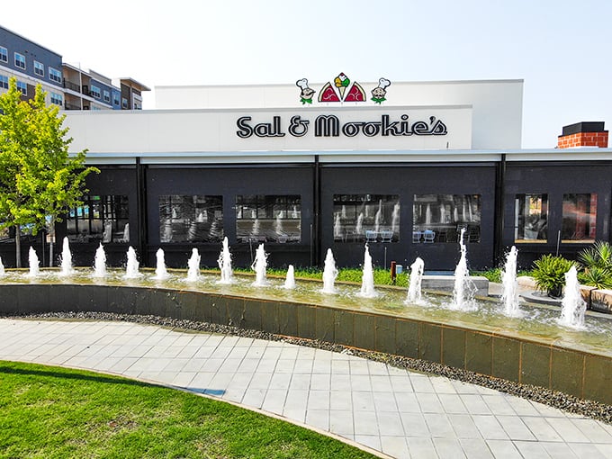 Sal & Mookie's fountains create dinner theater while wood-fired ovens work their smoky magic behind those modern walls.