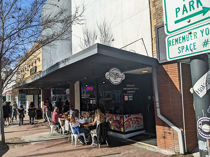 Street-side dining in Savannah where the city's energy becomes the perfect seasoning for fresh catches.