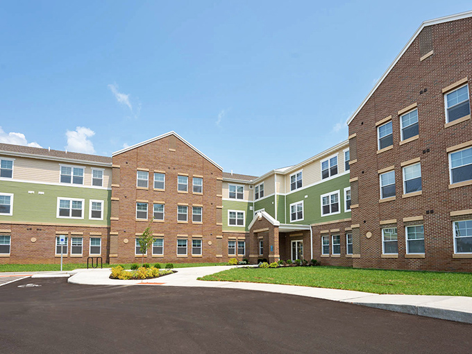 Brick and siding blend beautifully at this Florence gem where your wallet breathes easier than your old mortgage.