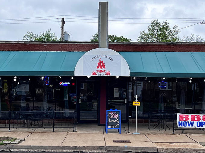 The blue awning might be modest, but what's happening inside those smokers is anything but ordinary.